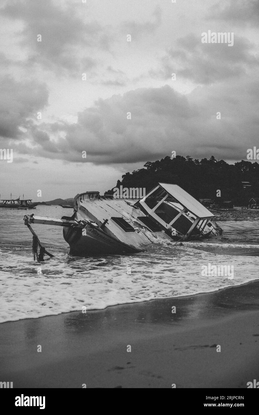 A monochrome view of an abandoned ship on the shoreline Stock Photo - Alamy