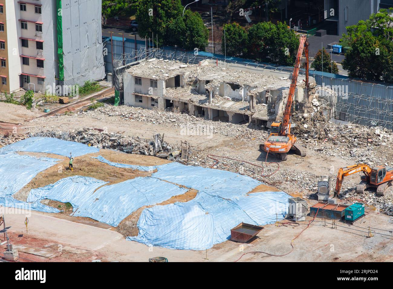 Close-up of old public housing building in demolition at Redhill Close ...