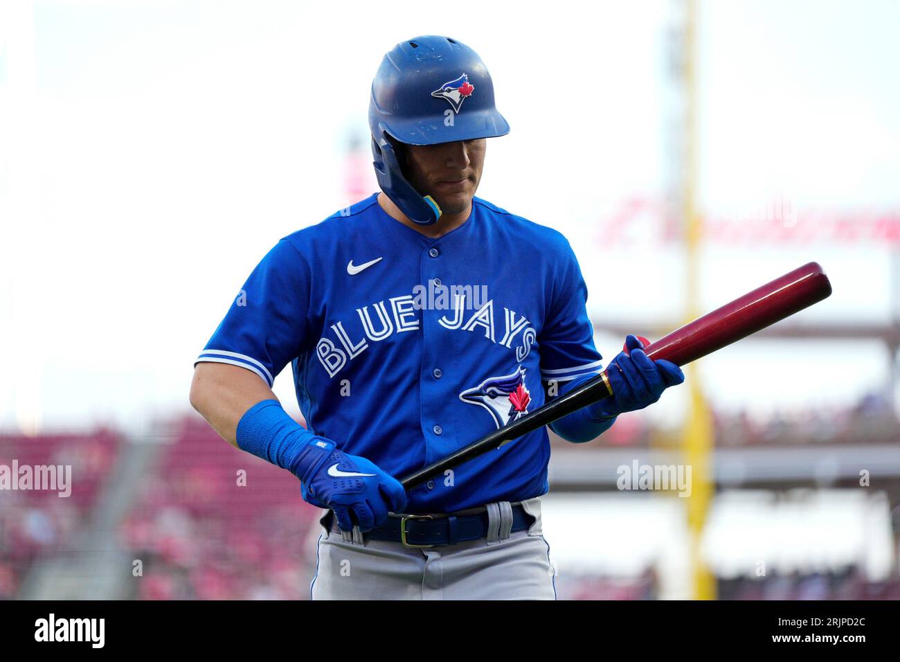 Toronto Blue Jays' Daulton Varsho walks to the dugout during a baseball ...