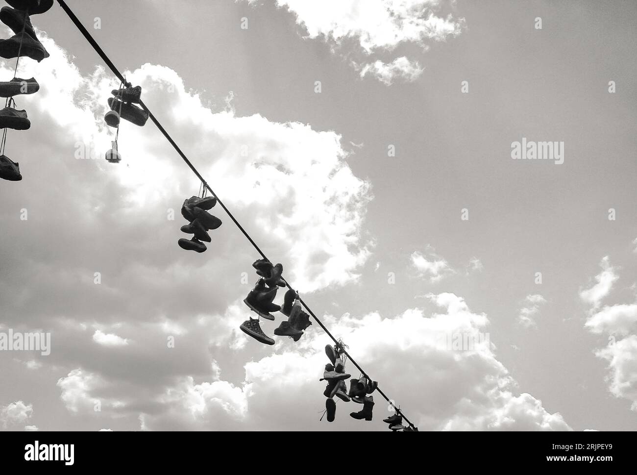 Prague metronome sneakers on rope hi-res stock photography and images ...