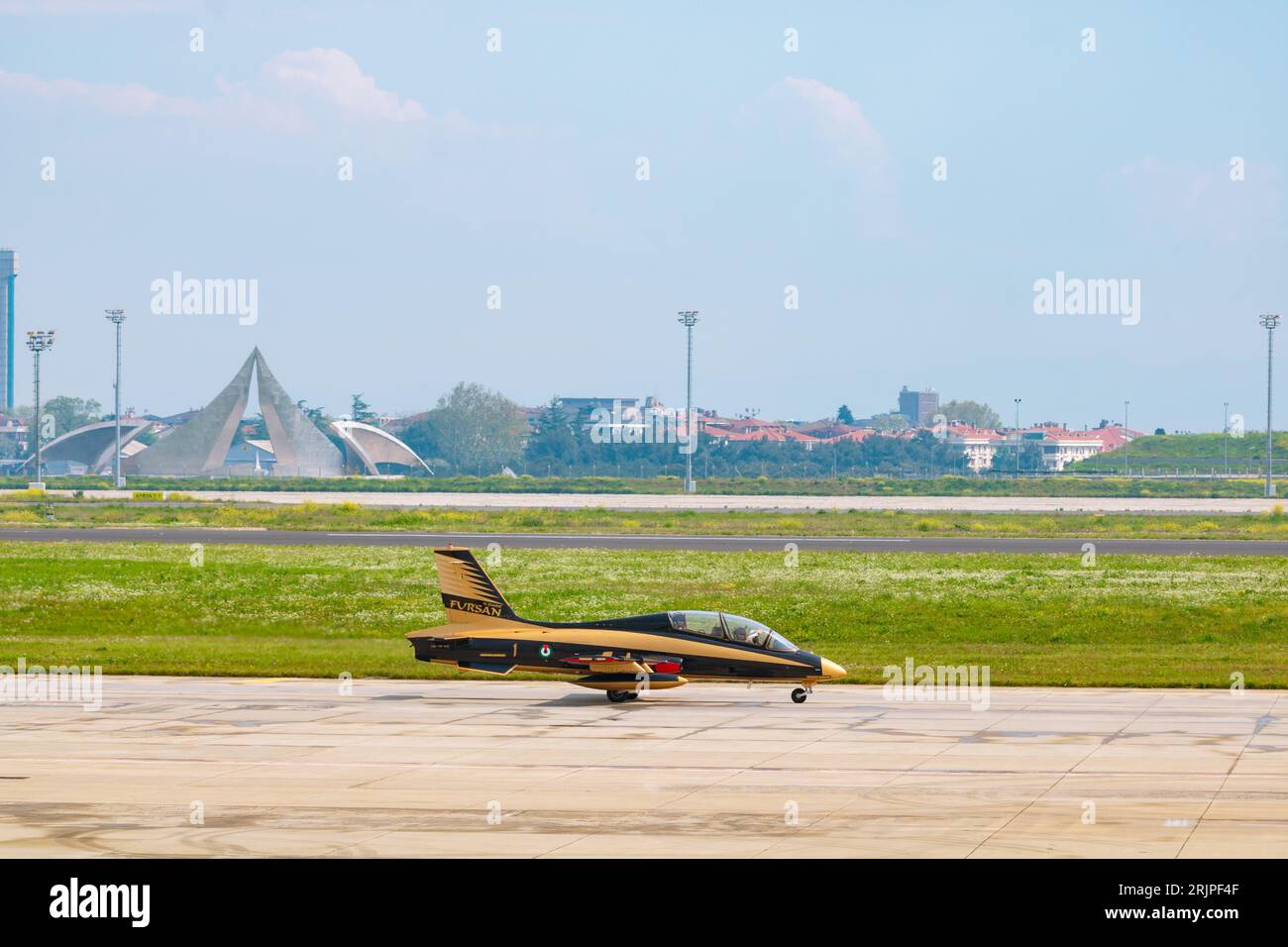 Fighter jet of Fursan el amarat aerobatic team on the runway in Ataturk ...