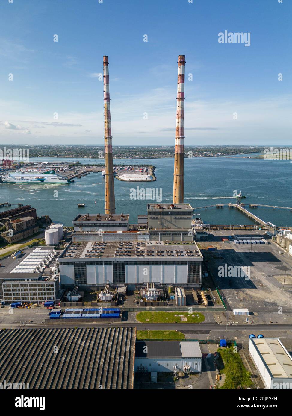 A stunning aerial view of Poolbeg towers in Dublin Port on a beautiful ...