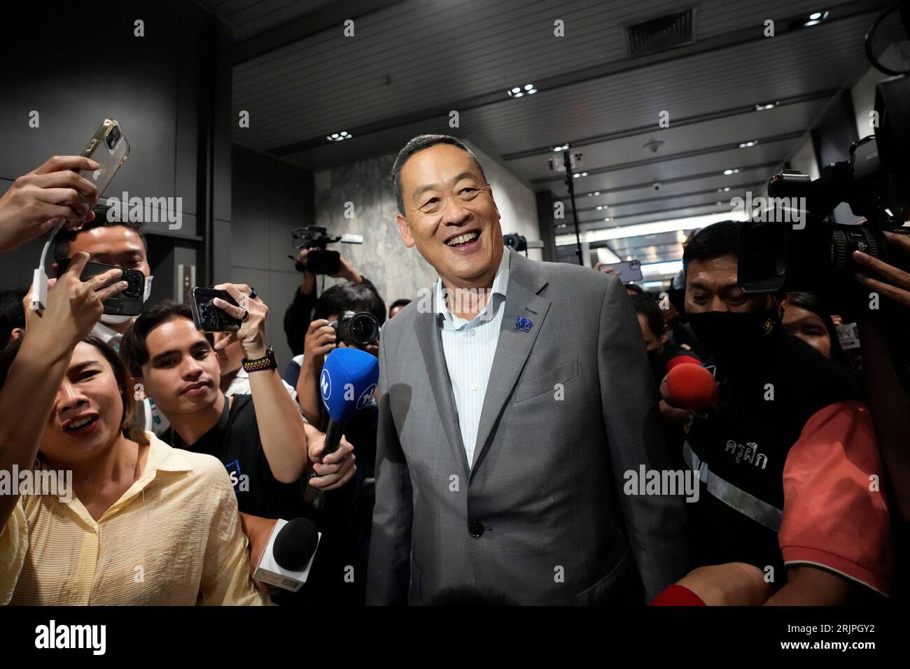 Thailand's new prime minister Srettha Thavisin leaves a press ...