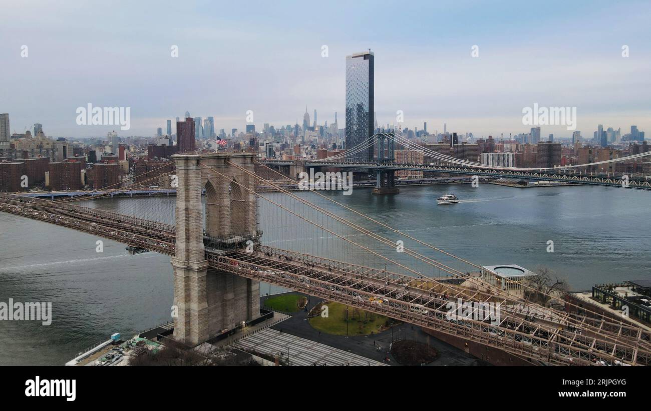 An aerial view of the iconic Brooklyn Bridge in the New York Harbor ...