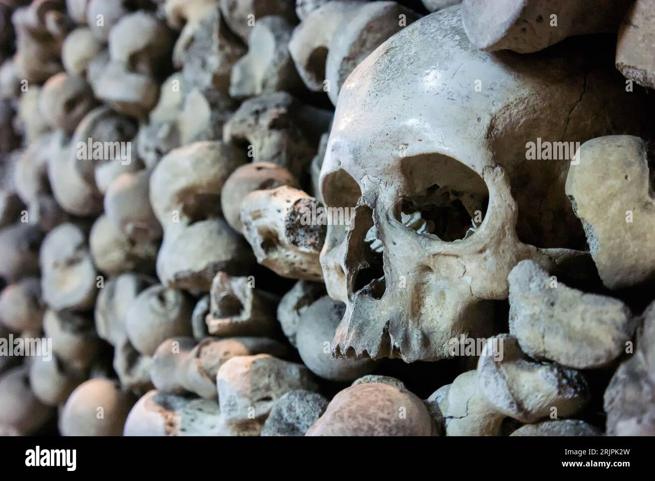 A collection of ancient human sculls and bones in the crypt of St ...