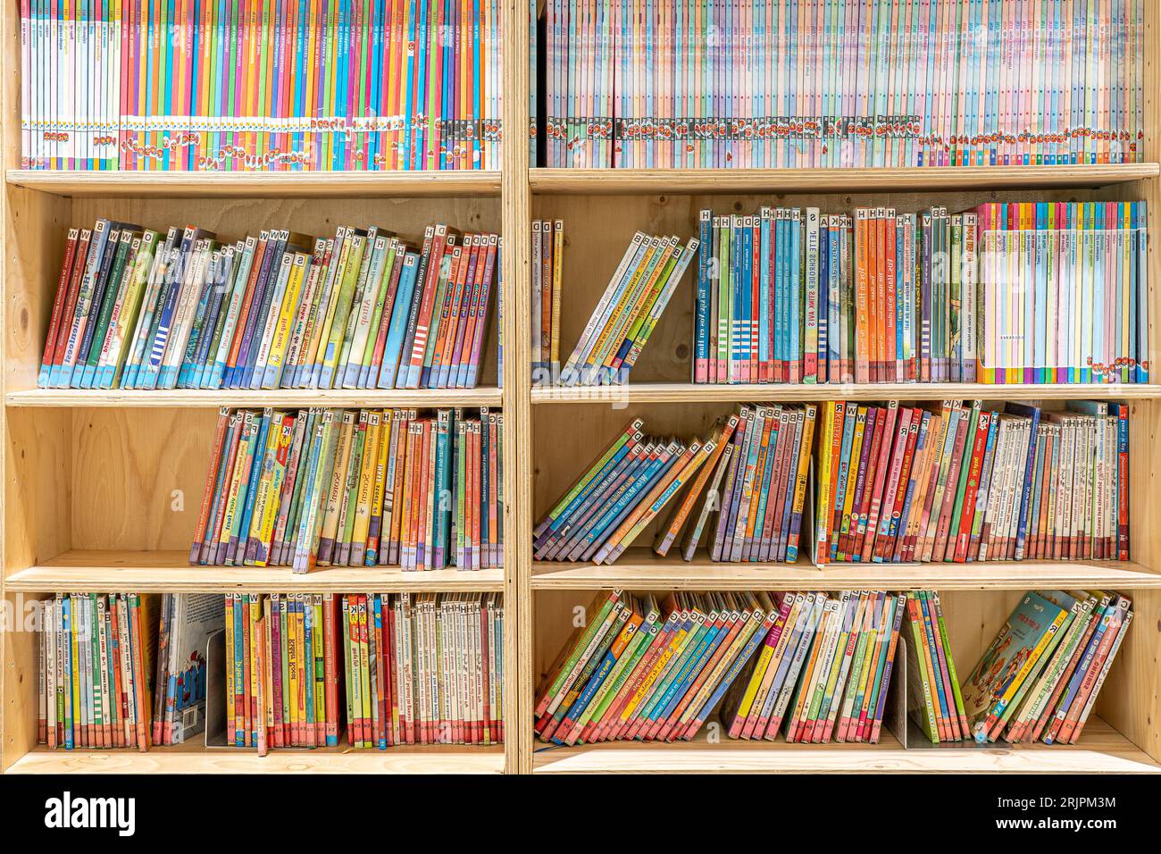 A cozy library with colorful children's books Stock Photo - Alamy