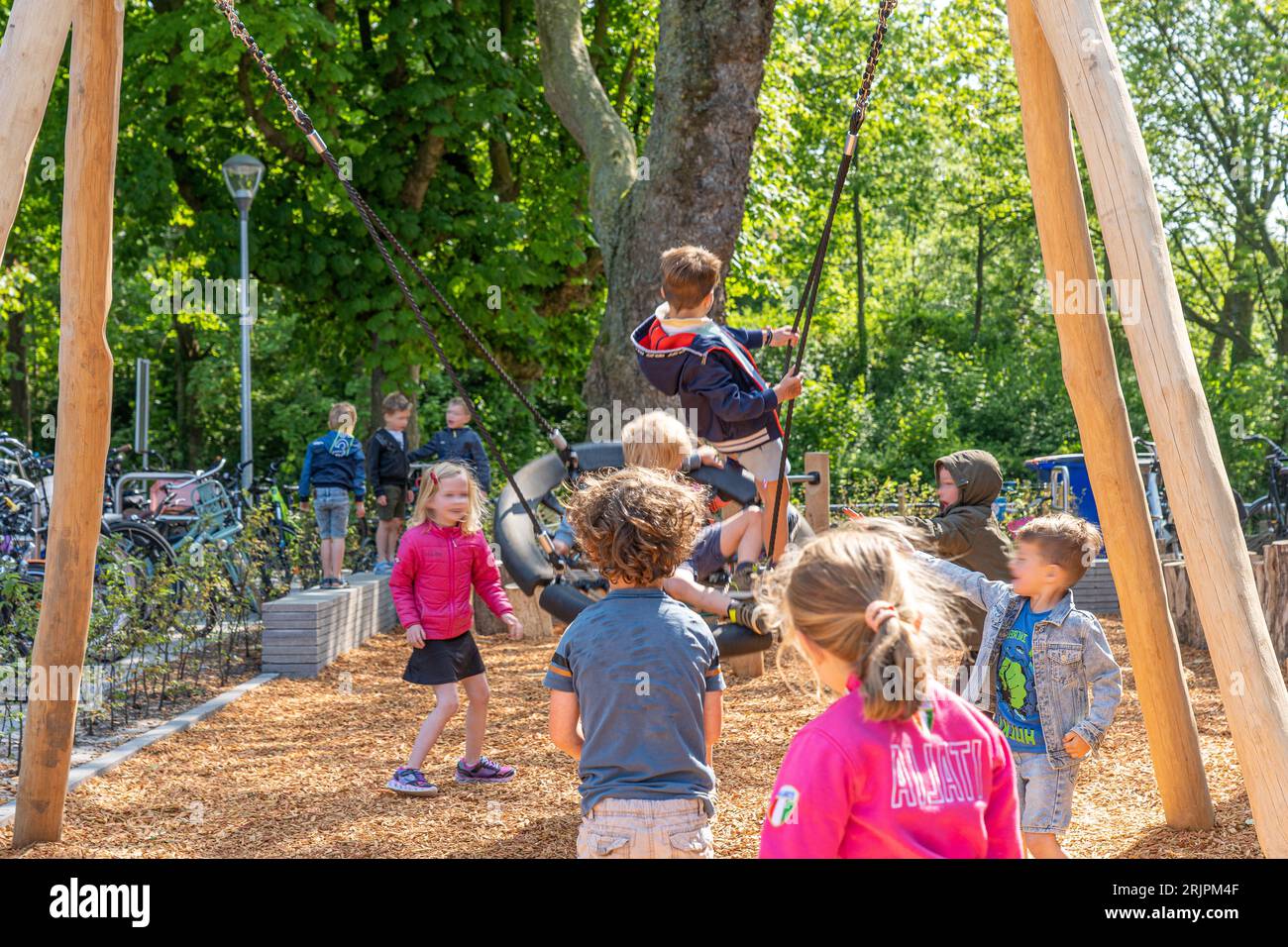 Children group playground running hi-res stock photography and images ...
