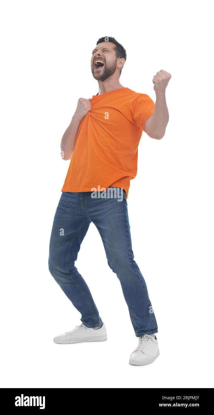 Emotional sports fan celebrating on white background Stock Photo - Alamy