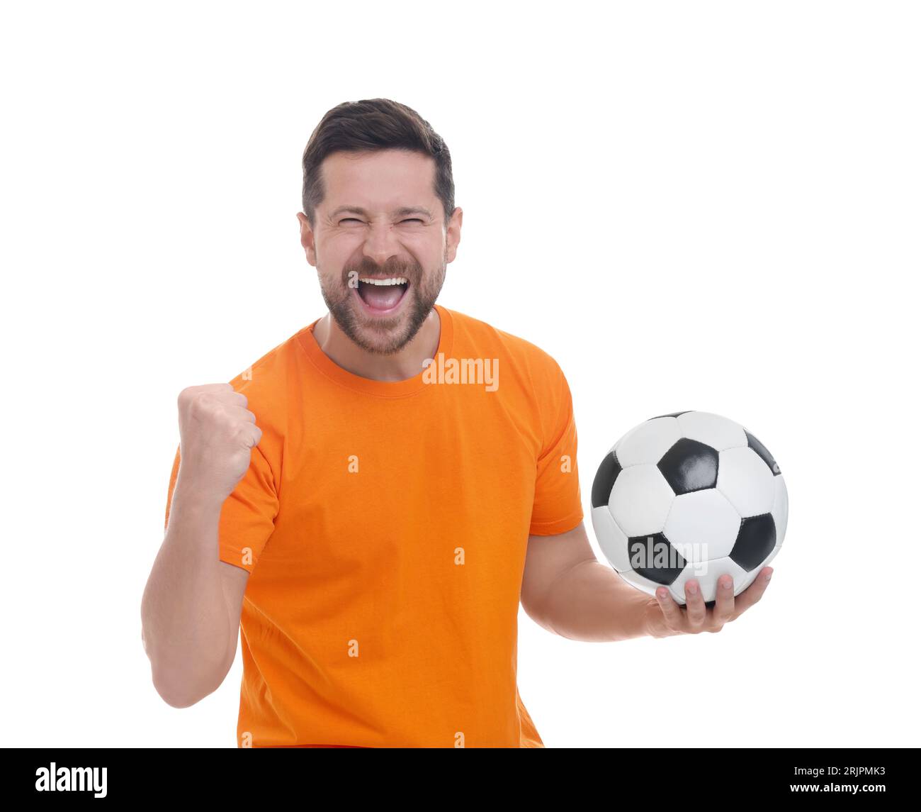 Emotional sports fan with ball celebrating on white background Stock ...