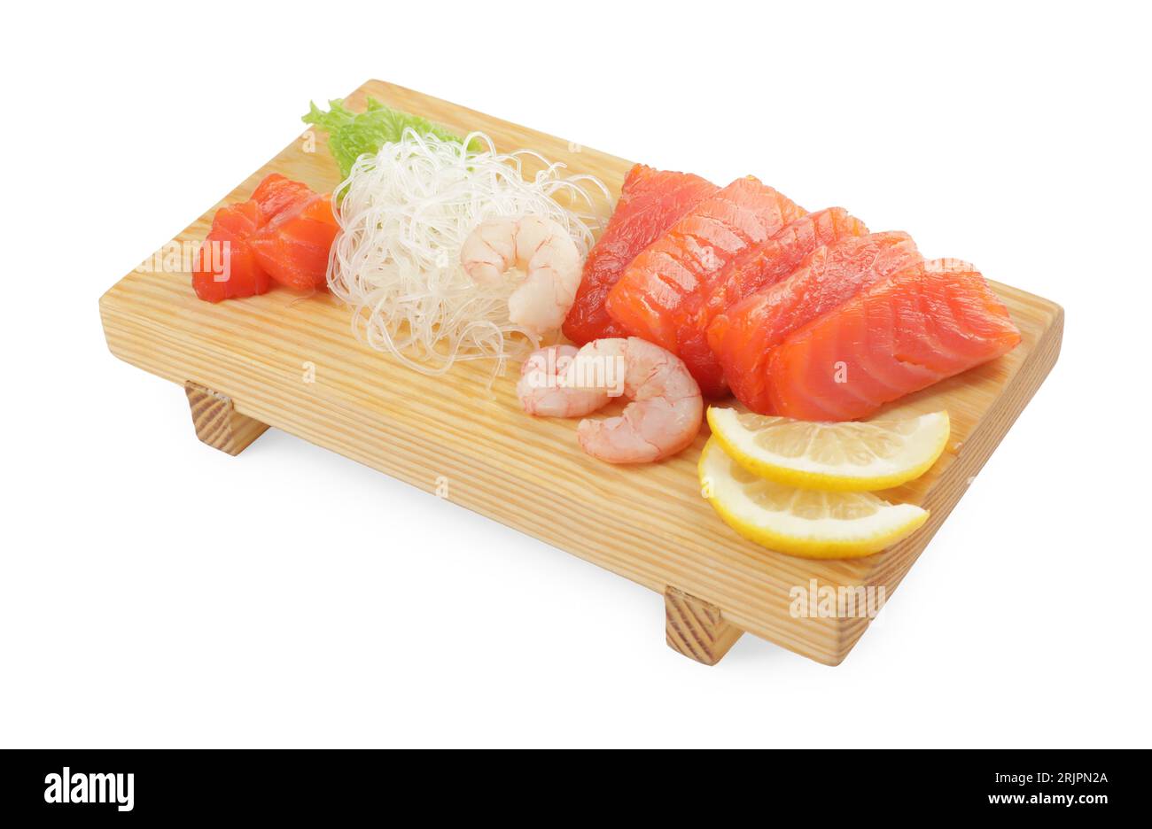 Delicious sashimi set of salmon and shrimps served with funchosa, lemon ...