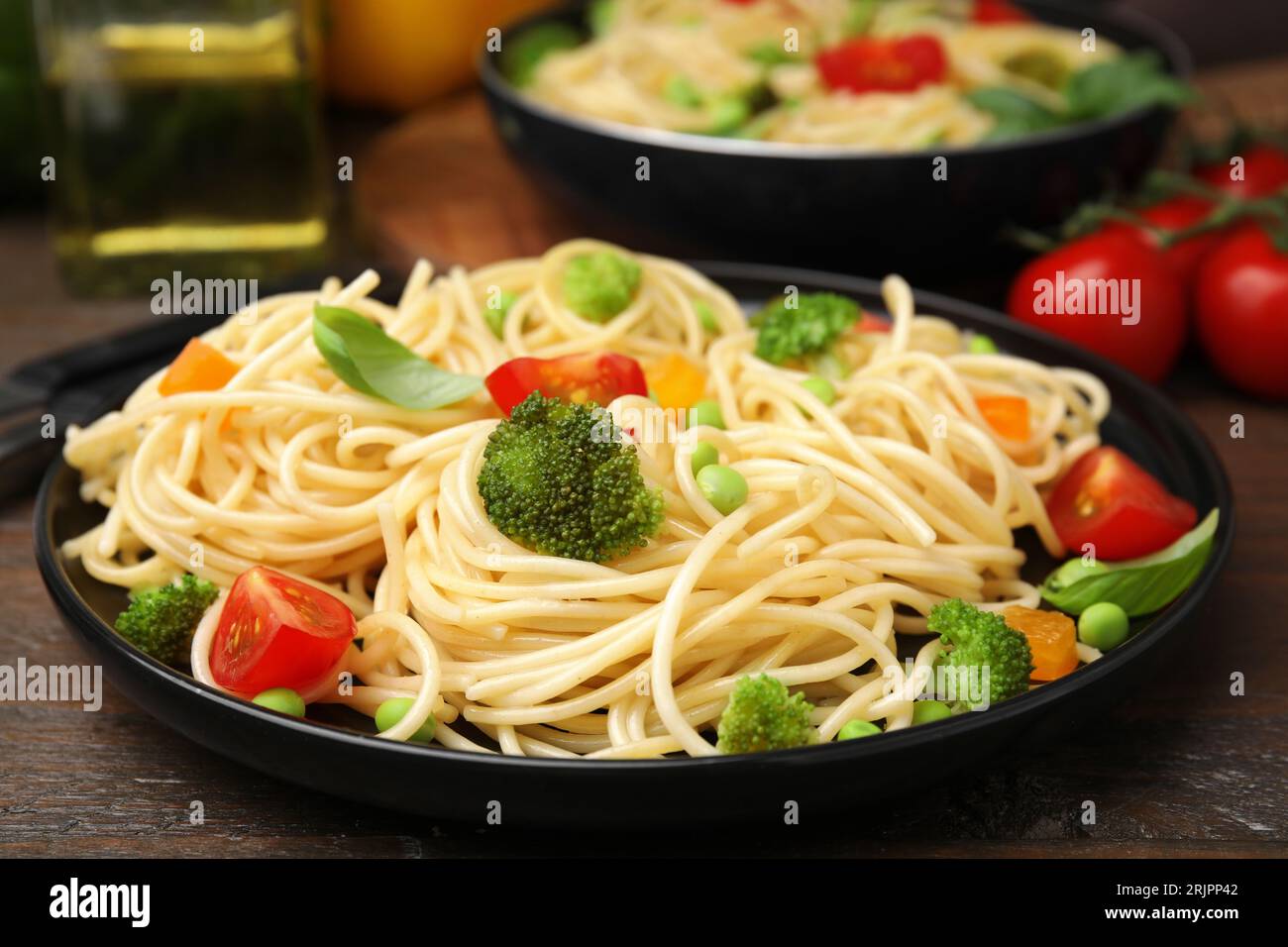 Plate of delicious pasta primavera, closeup view Stock Photo - Alamy