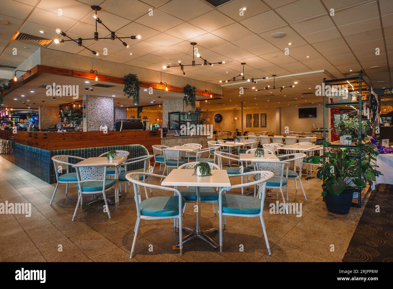 A modern cafe dining room interior with no people present Stock Photo ...