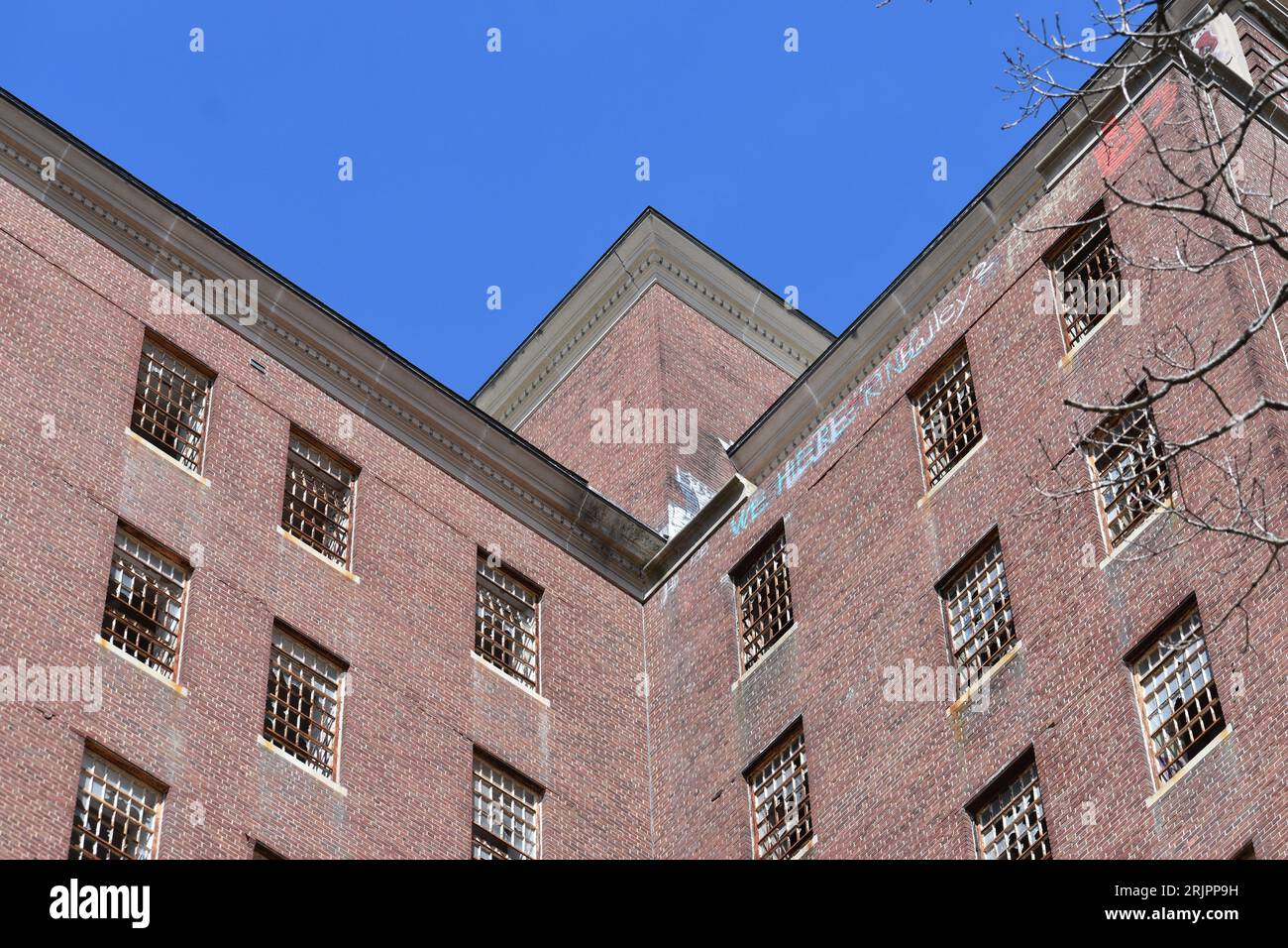 Modern building facade featuring a geometric pattern of windows hi-res ...