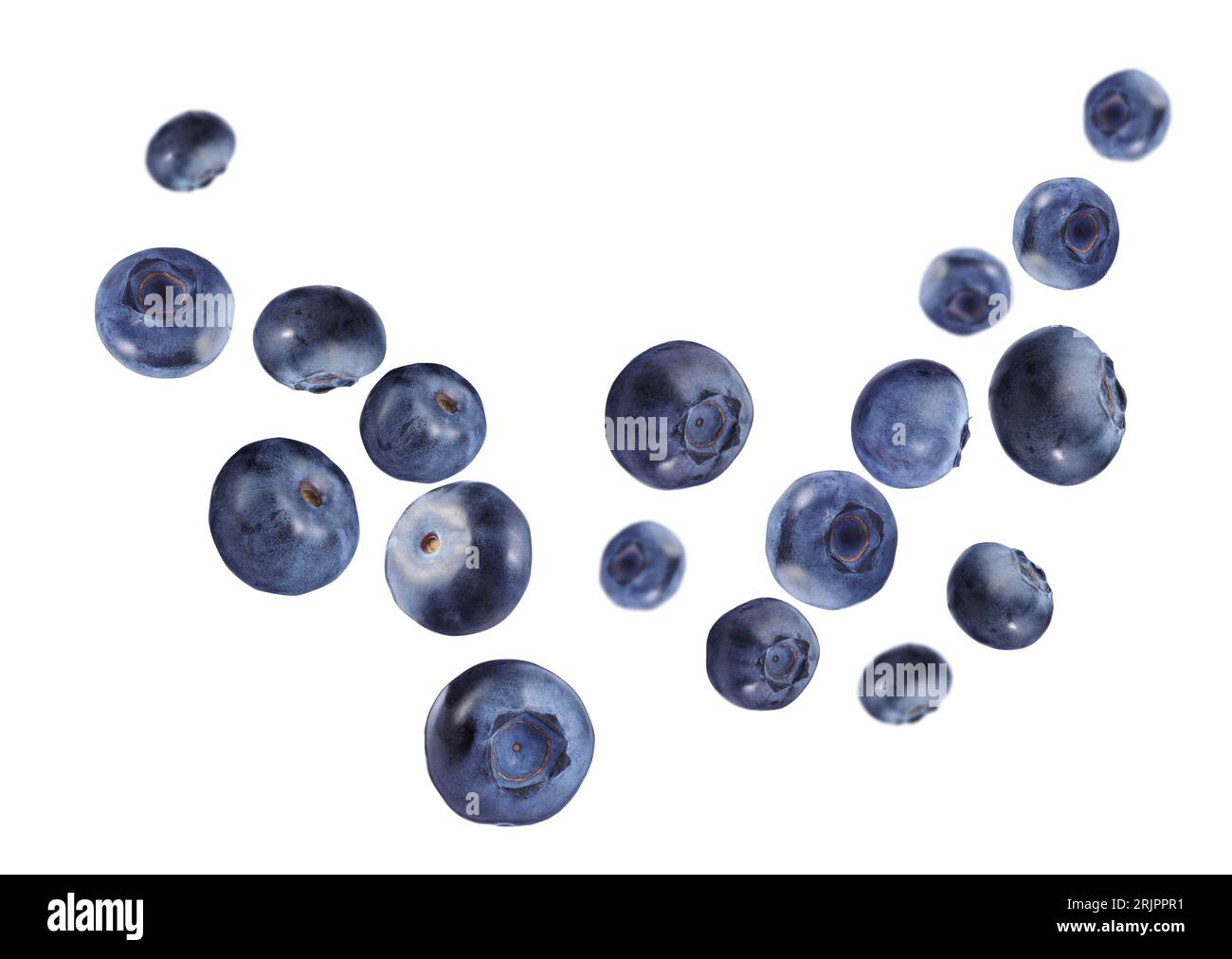 Many ripe blueberries falling on white background Stock Photo - Alamy