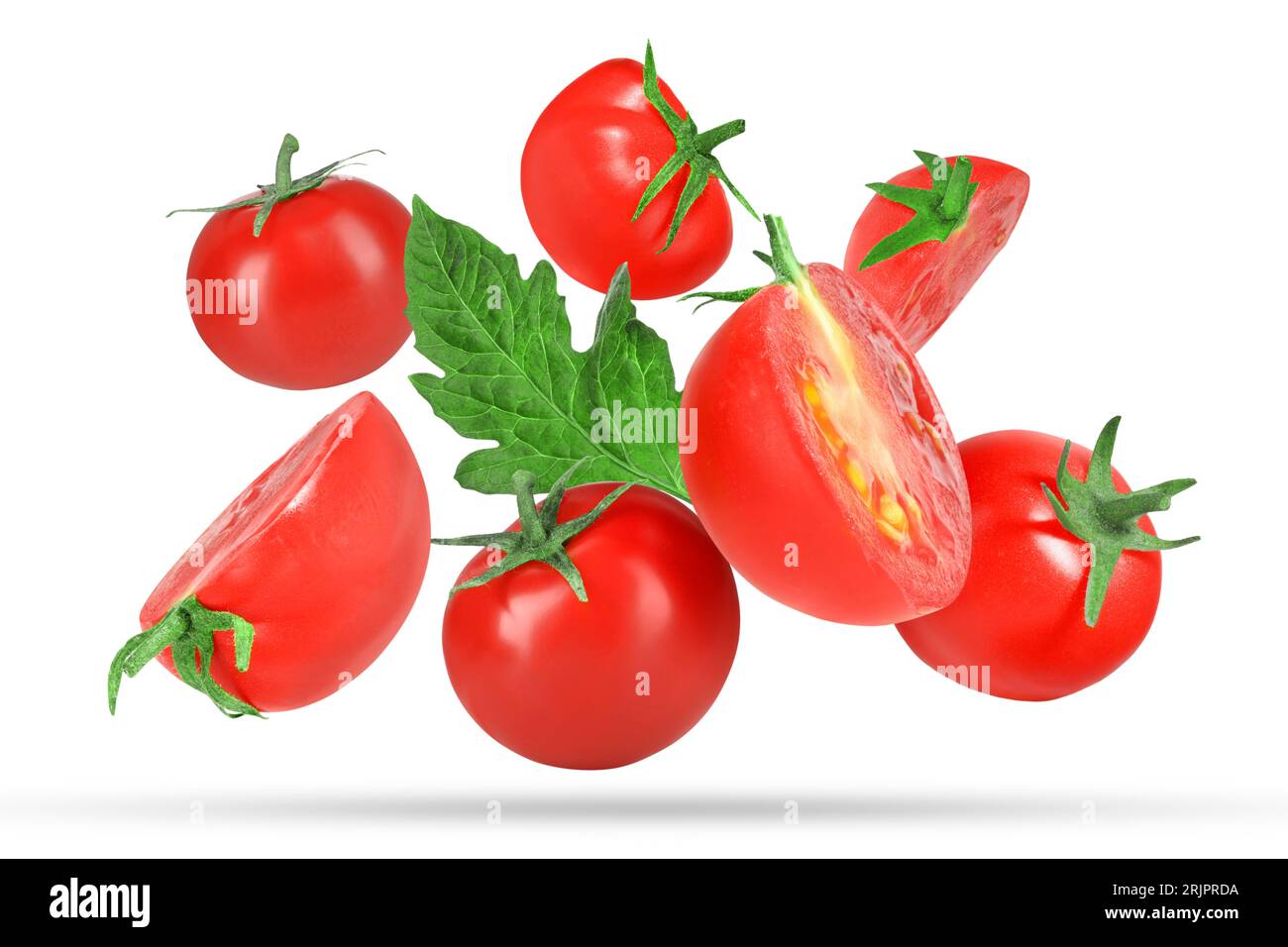 Many fresh ripe tomatoes falling on white background Stock Photo - Alamy