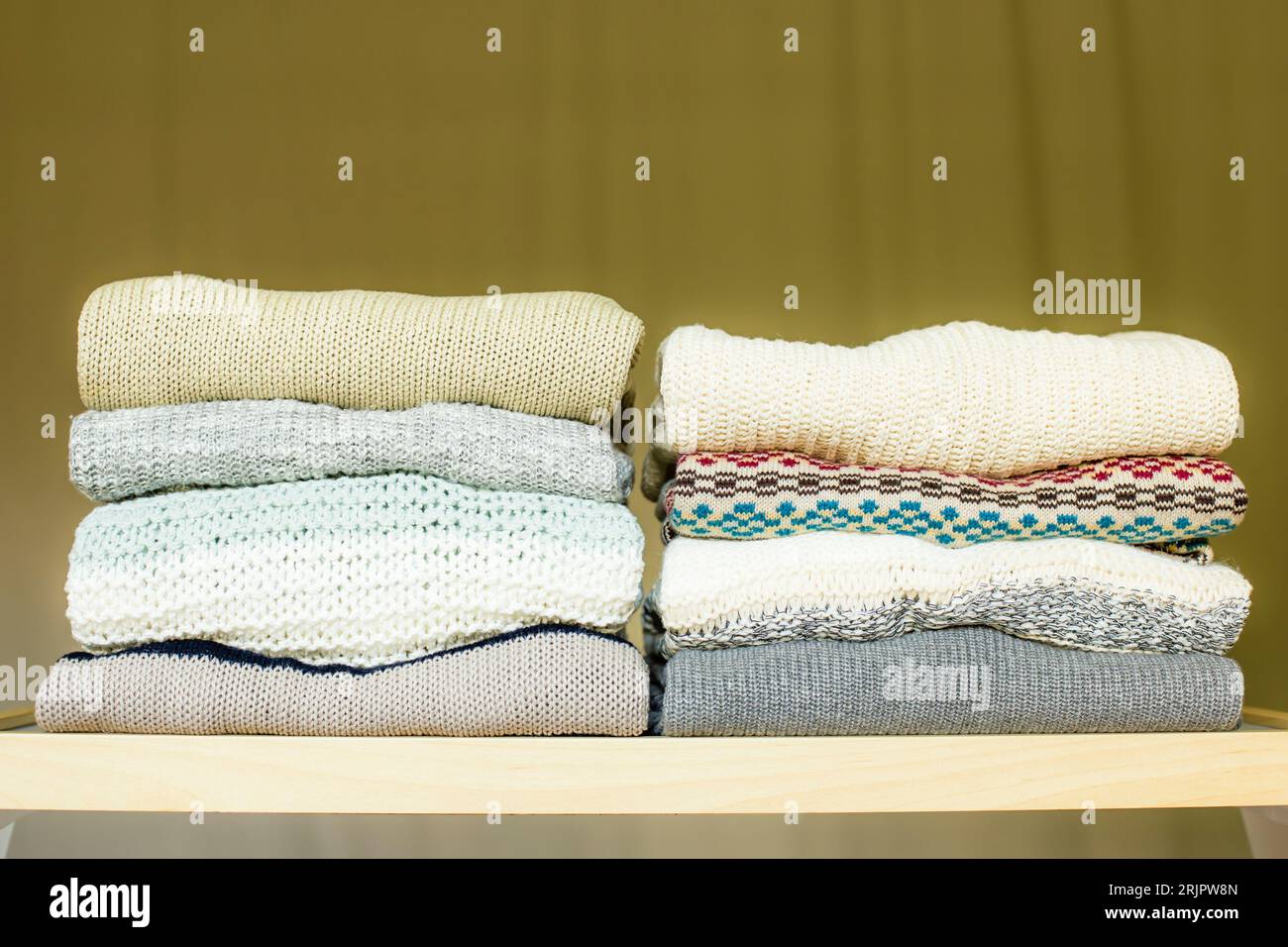 Sweaters on shelves hi-res stock photography and images - Alamy
