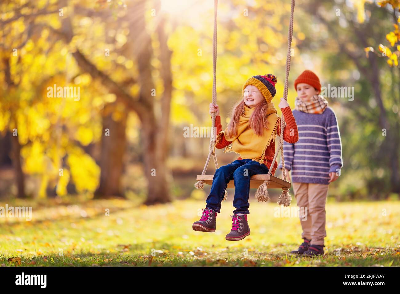 Romantic couple on swing cute hi-res stock photography and images - Alamy