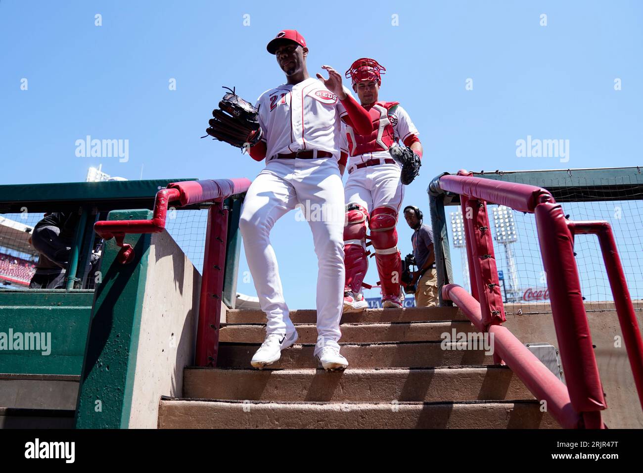 Cincinnati Reds starting pitcher Hunter Greene (21) walks to the dugout ...