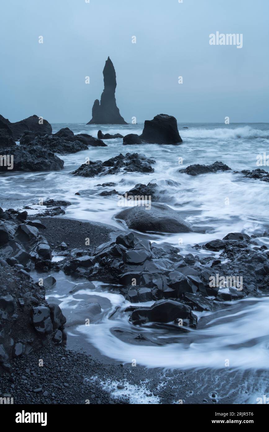 Dramatic Coastal scenery with sea arches and basalt columns near Via ...