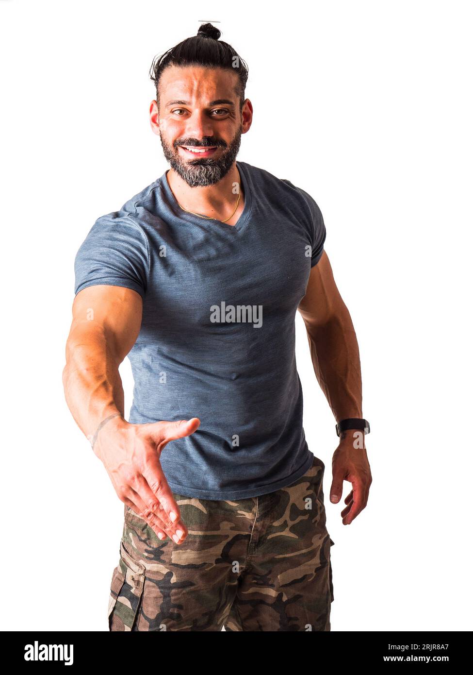 Photo of a muscular man with a goatee and beard posing for a picture ...