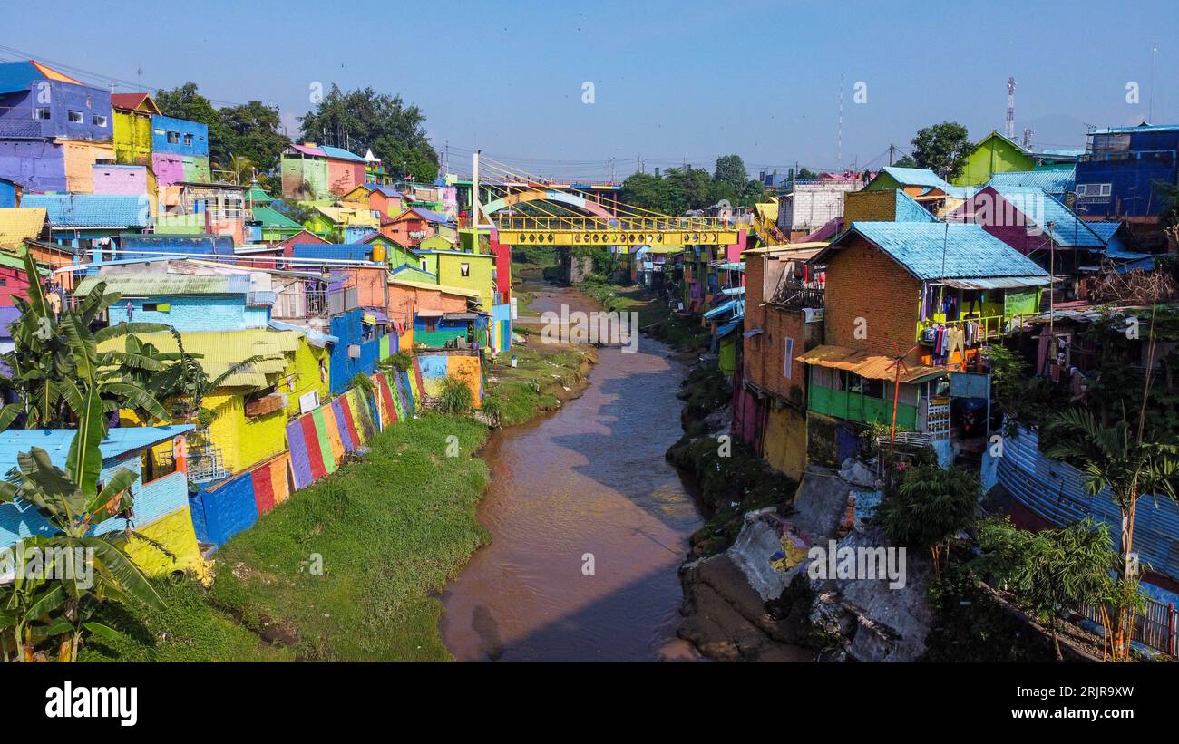 A stunning aerial view of the vibrant city of Malang with colorful ...
