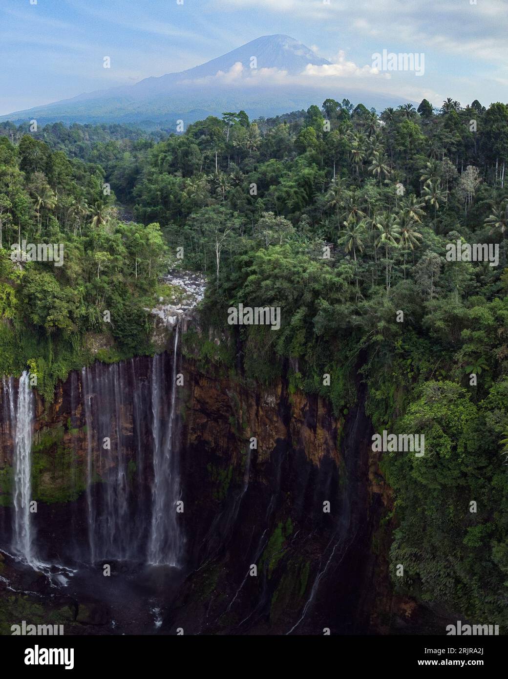 An aerial view of the stunning Lumajang Sewu Waterfall in Indonesia ...
