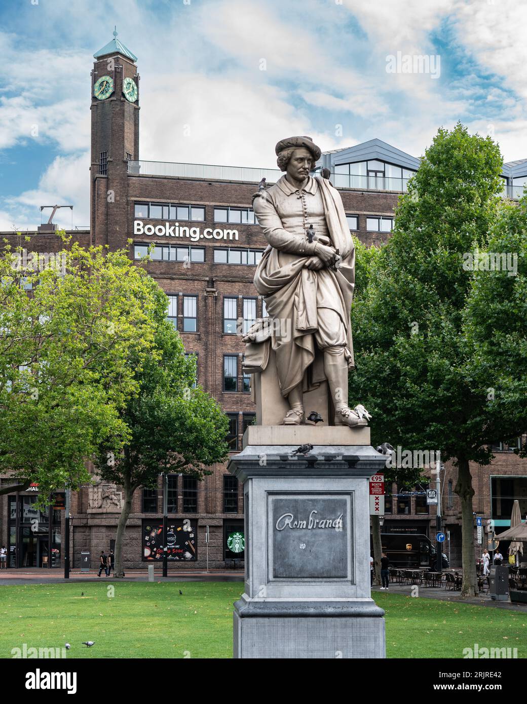 The Rembrandt statue in Rembrandtplein, with the Booking.com HQ in the ...