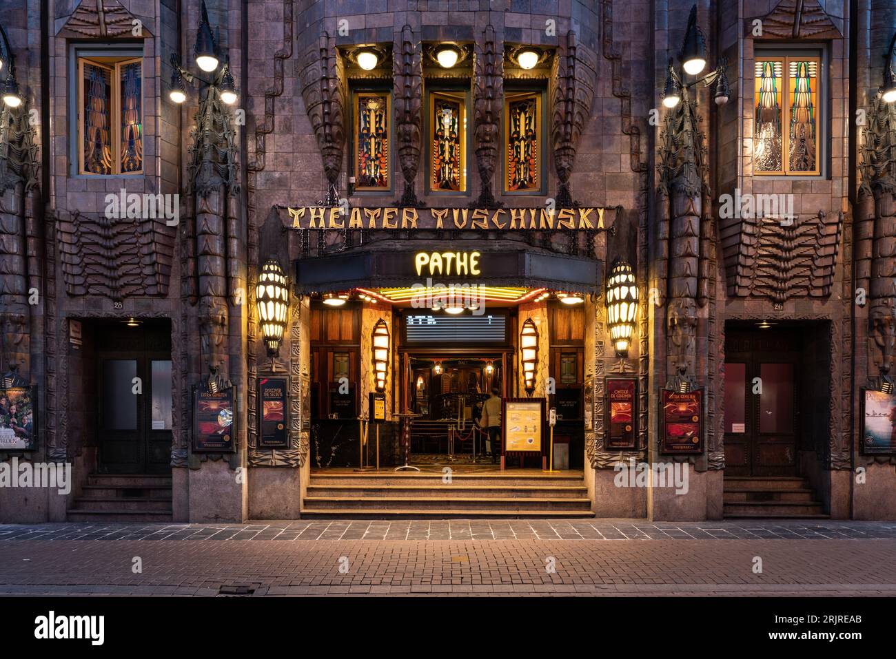 Night time photograph of the Theater Tuschinski, also known as the ...
