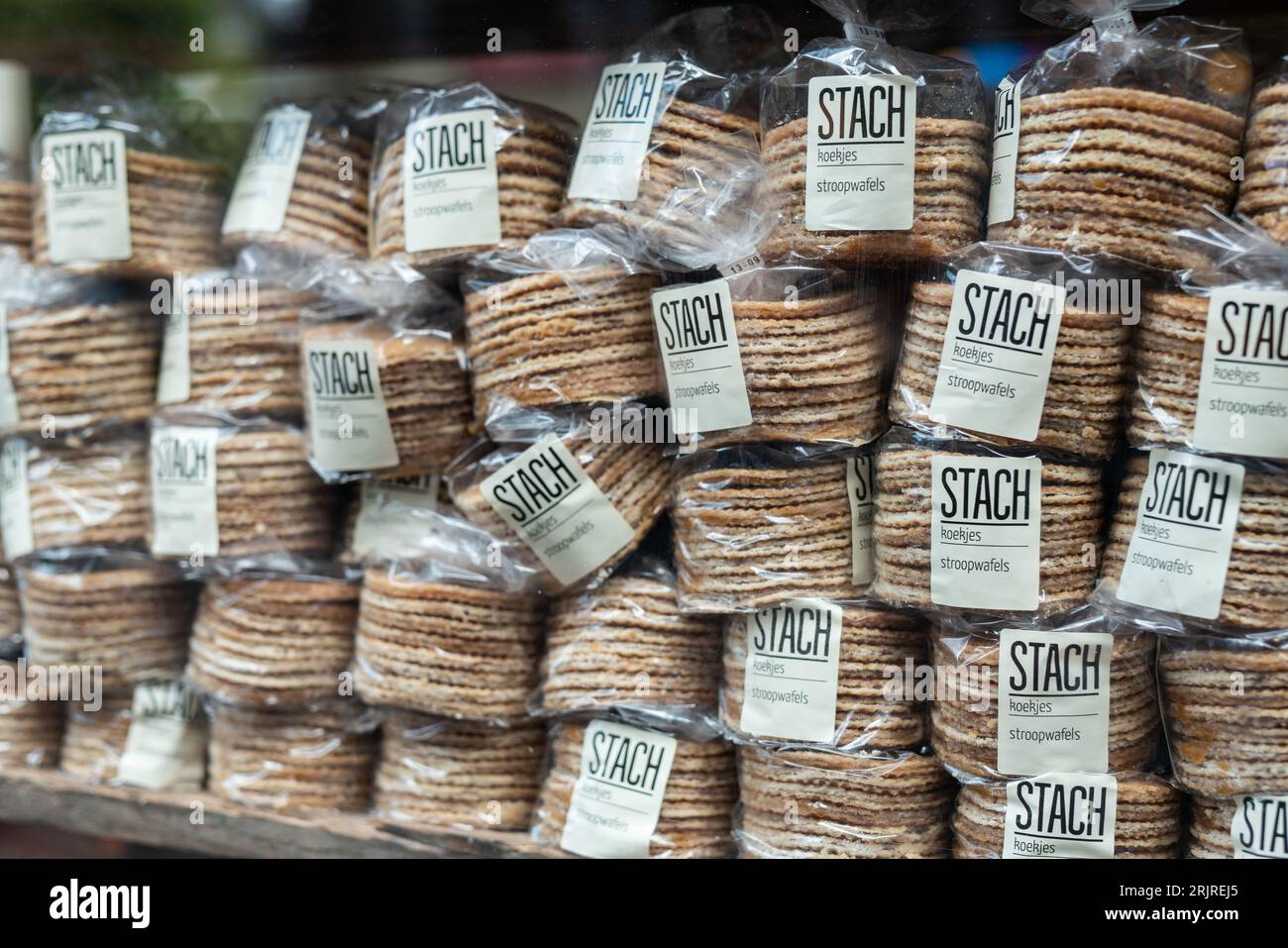 A pile of stroop waffles are displayed in a shop window in Amsterdam ...
