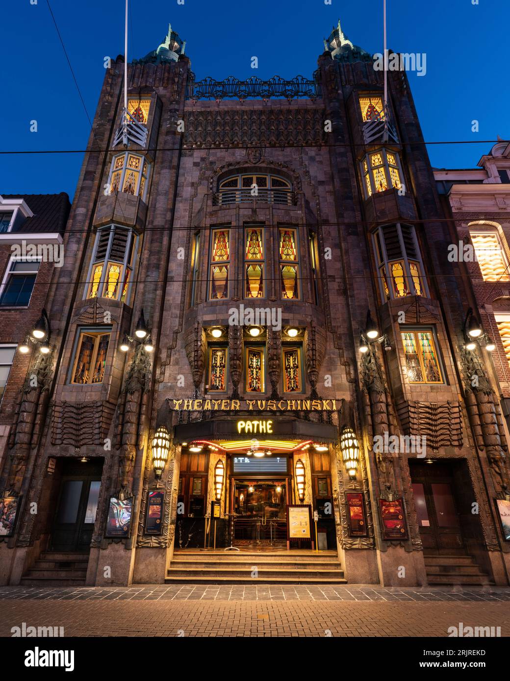 Night time photograph of the Theater Tuschinski, also known as the ...