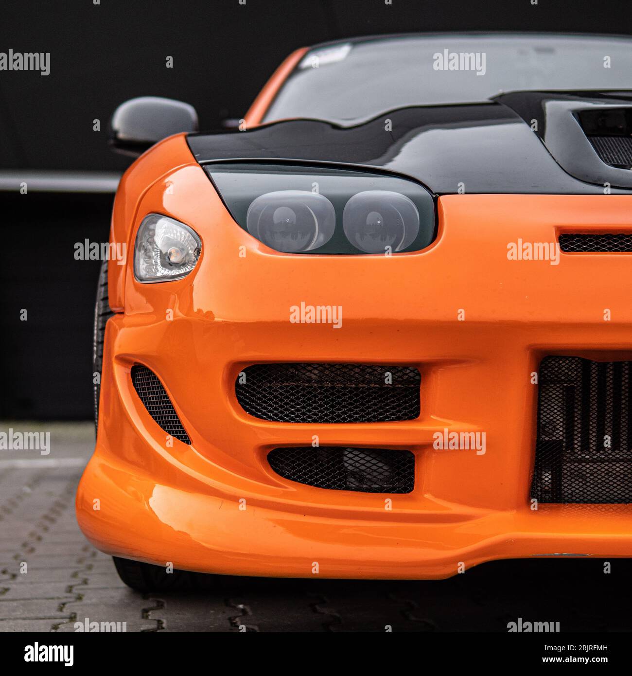 A closeup of front end of a modern sports car Stock Photo - Alamy