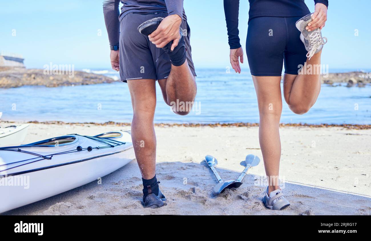 Beach legs, rowing and stretching people, partner or couple of friends ...