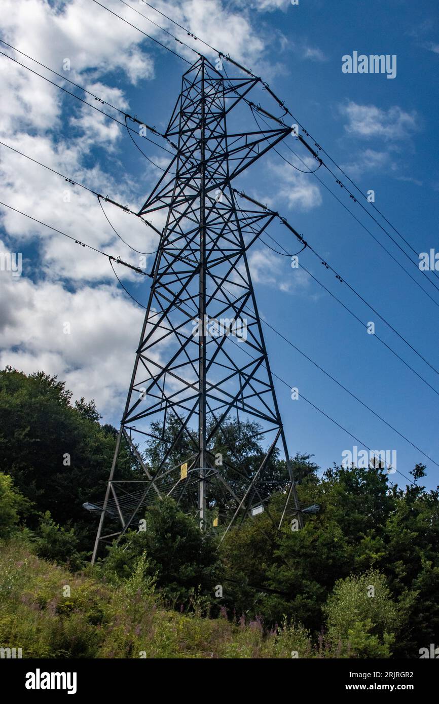 Electricity pylon on hillside hi-res stock photography and images - Alamy