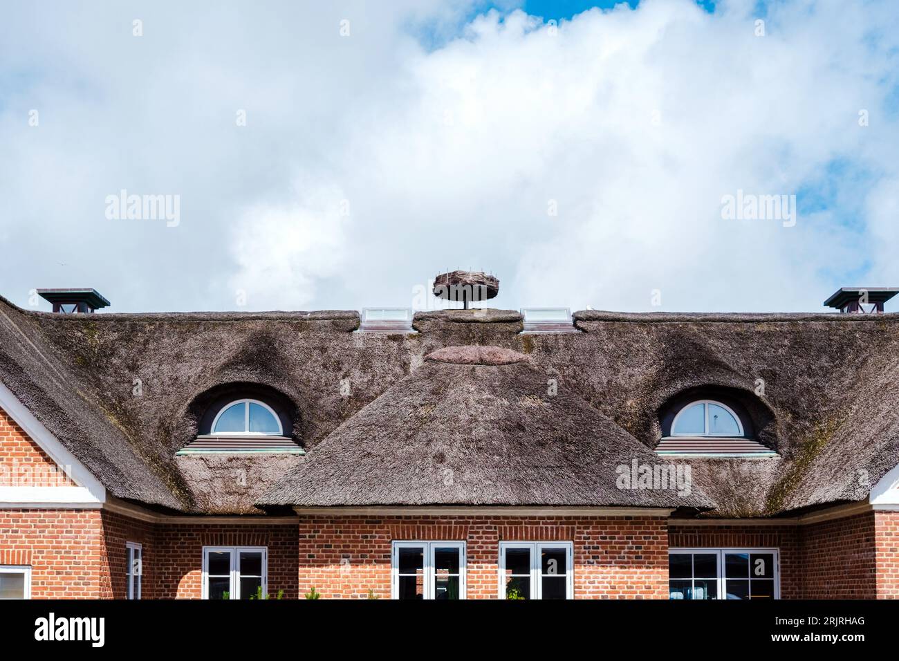 Artificial nests for storks on the roof of a house in Denmark Stock ...