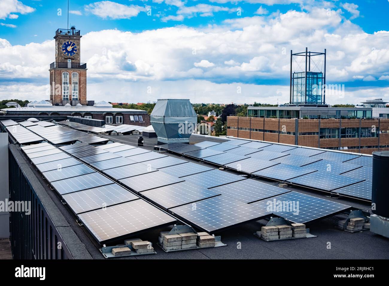Installation of solar panels on a flat roof, in the center of ...