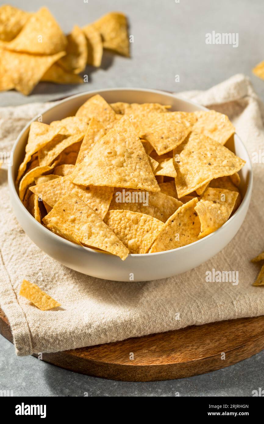 Homemade Triangle Tortilla Corn Chips in a Bowl Stock Photo - Alamy