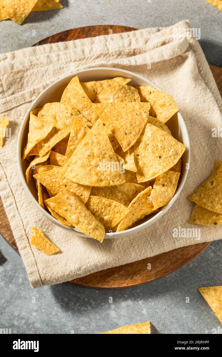 Homemade Triangle Tortilla Corn Chips in a Bowl Stock Photo - Alamy
