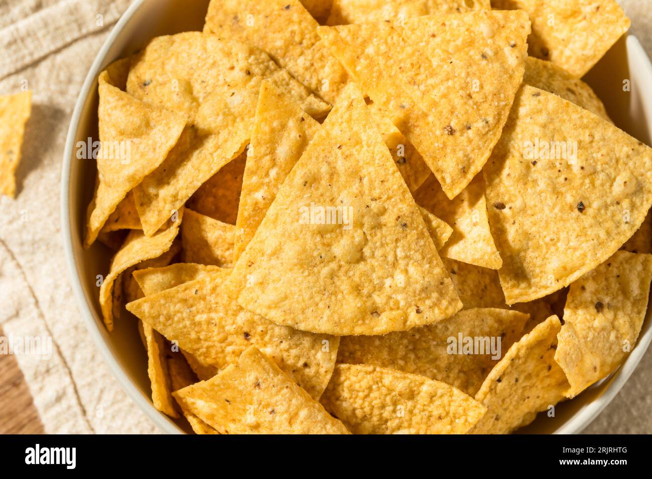 Homemade Triangle Tortilla Corn Chips in a Bowl Stock Photo - Alamy