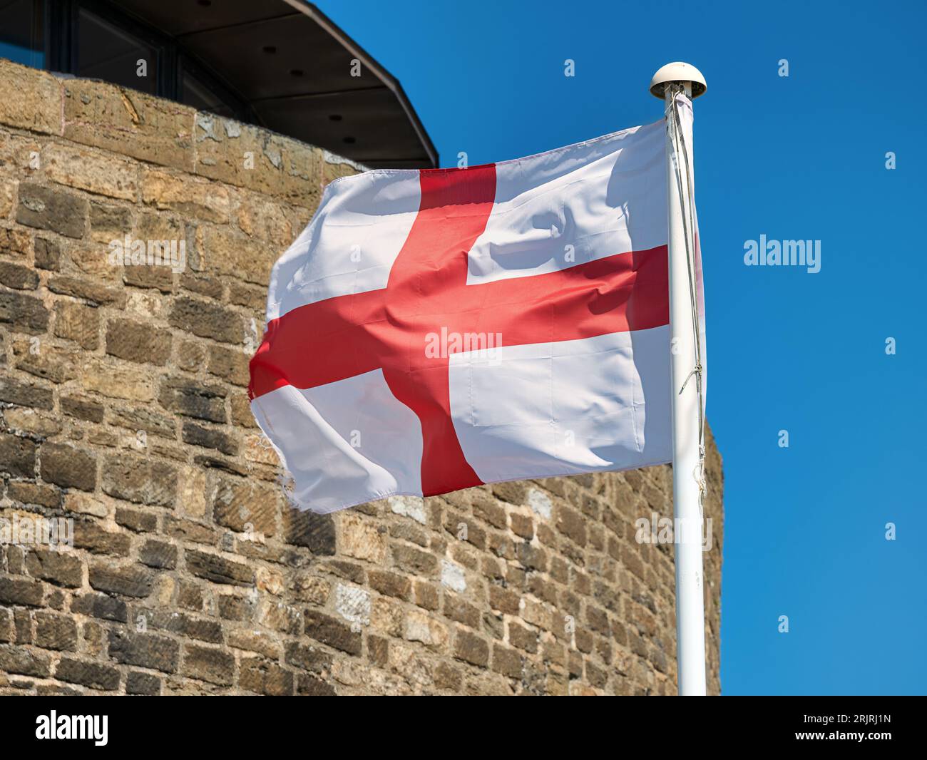 Saint George's Cross flag with Sandgate Castle in the background with a ...
