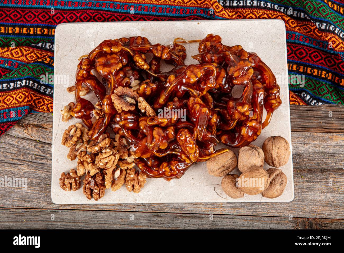 Walnut sucuk. Turkish natural dried fruit pulp with walnut sausage ...