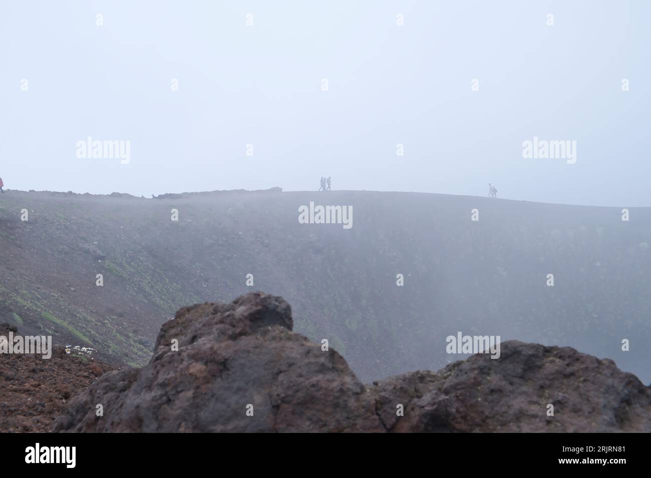 Etna volcanic landscape in fog in Sicily in southern Italy, ascent to ...