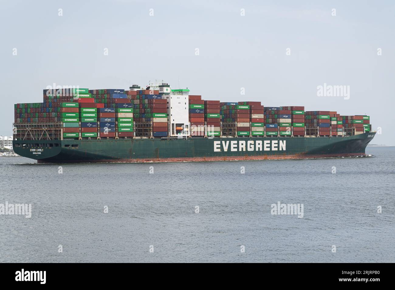A large industrial Evergreen cargo ship on the water near Charleston ...