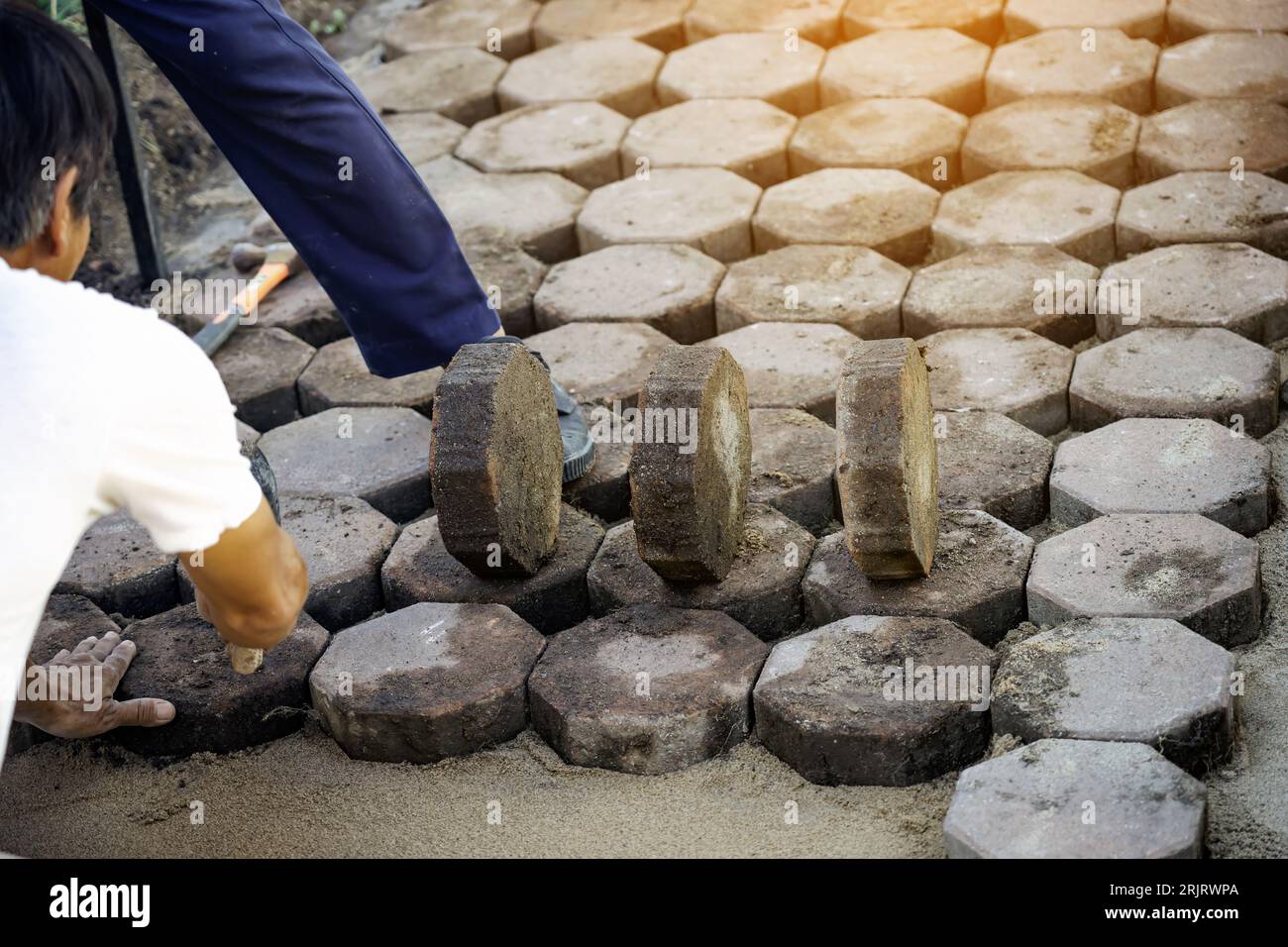 Construction site of pavement octagon bricks road. Installation or ...