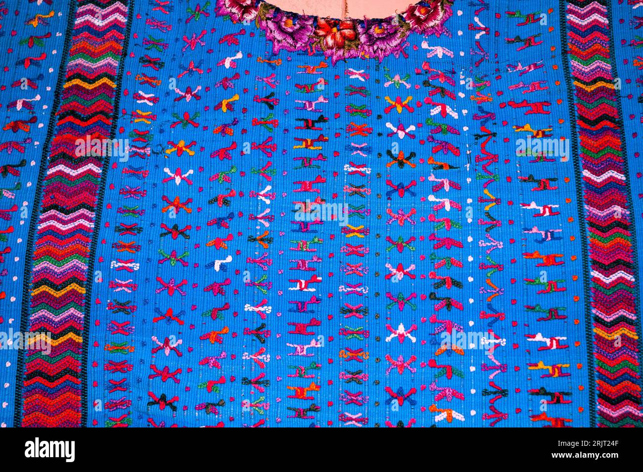 A closeup shot of details on handmade Milenary Mayan cultural textiles ...