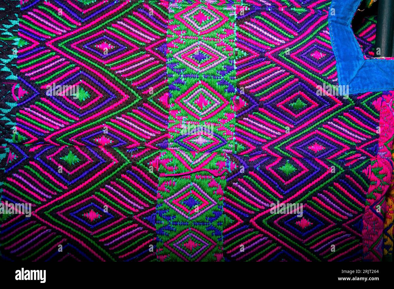 A closeup shot of details on handmade Milenary Mayan cultural textiles ...