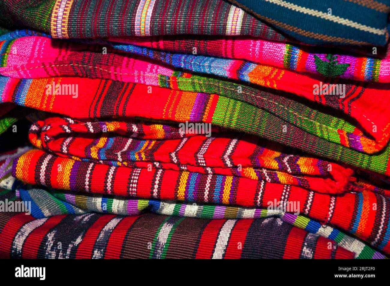 A closeup shot of details on handmade Milenary Mayan cultural textiles ...