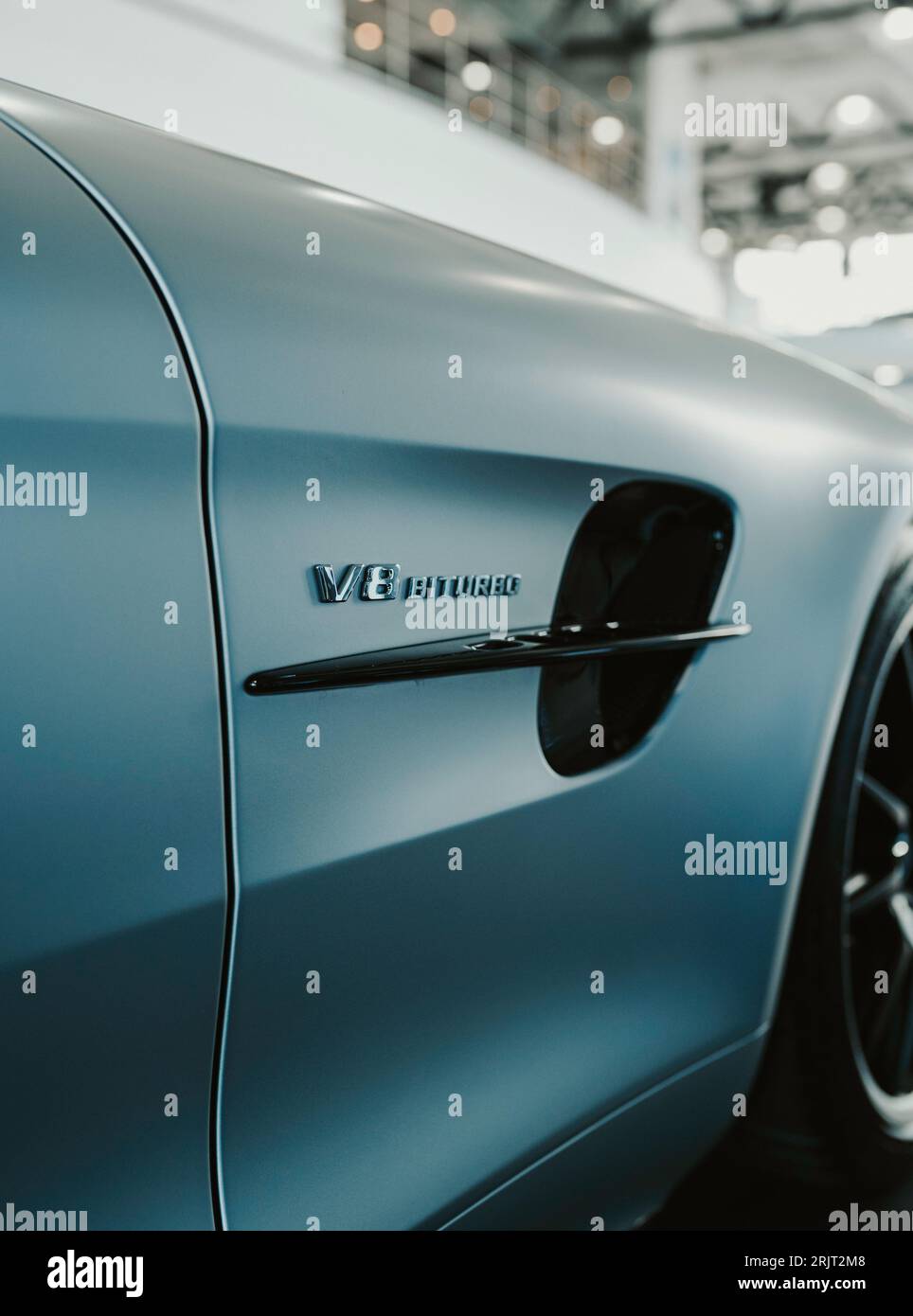 A vertical shot of details on a luxurious Mercedes Benz GT-R AMG car ...