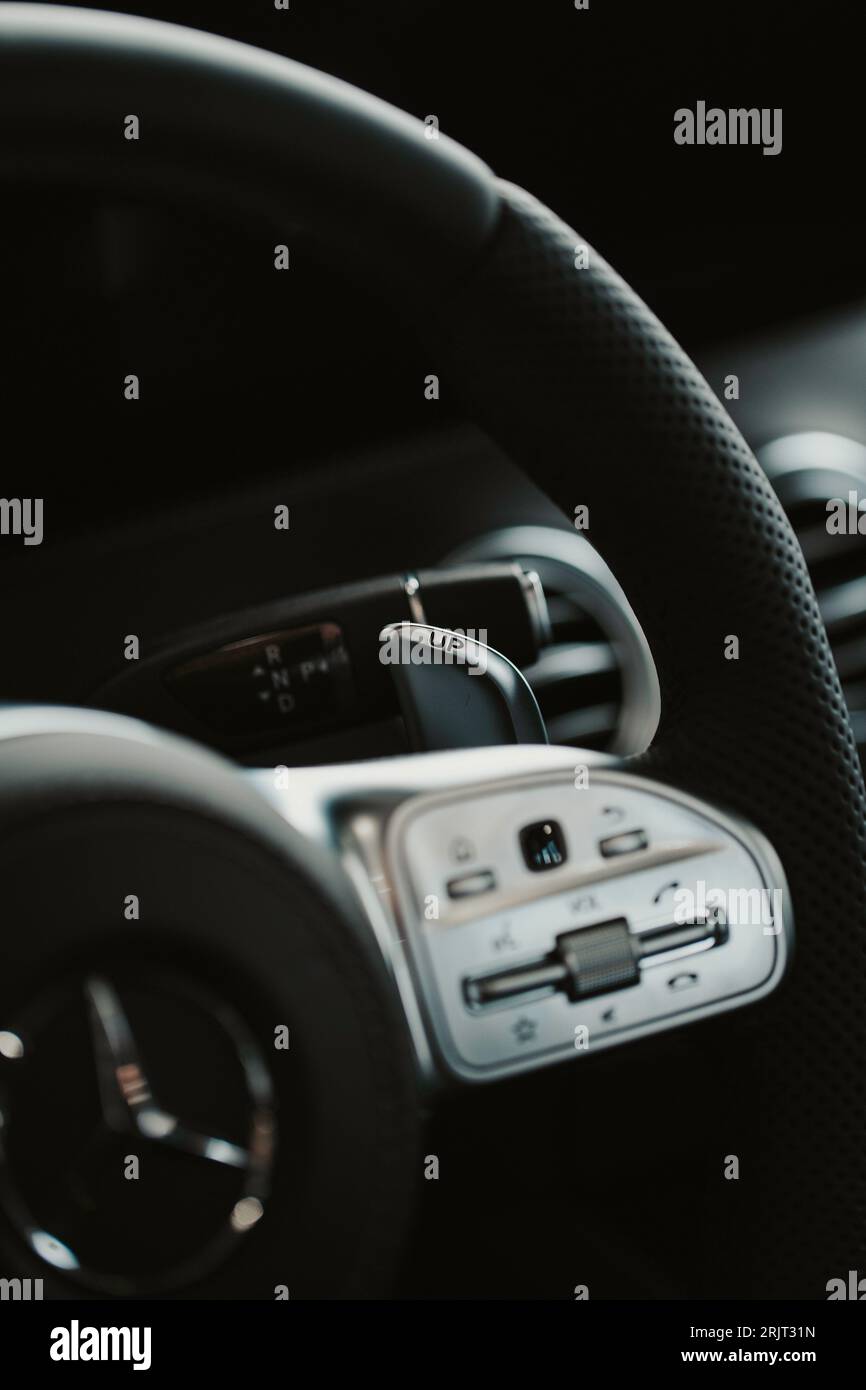 A vertical shot of details inside a luxurious Mercedes-Benz S63 car ...