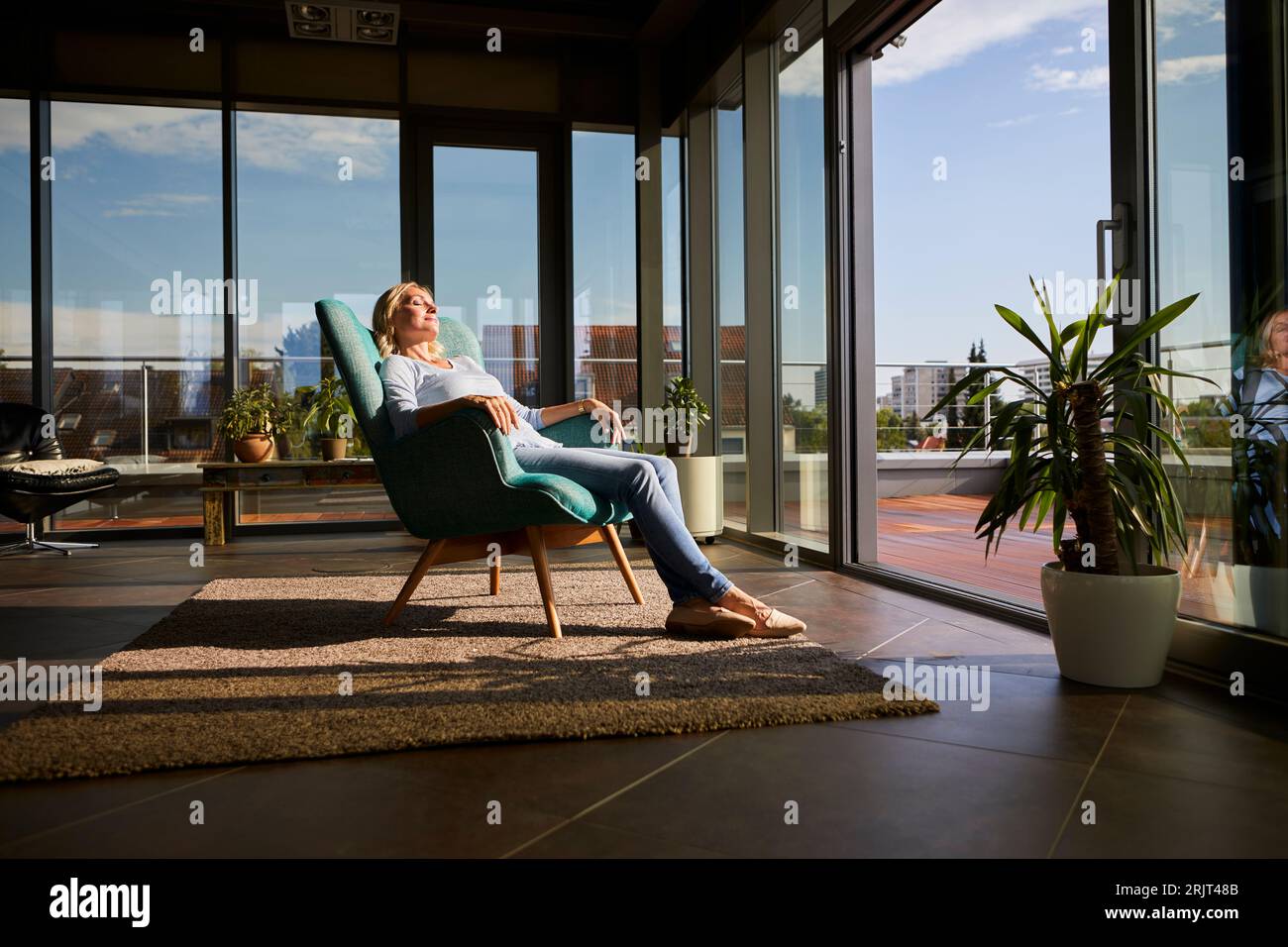 Woman relaxing evening glass hi-res stock photography and images - Alamy