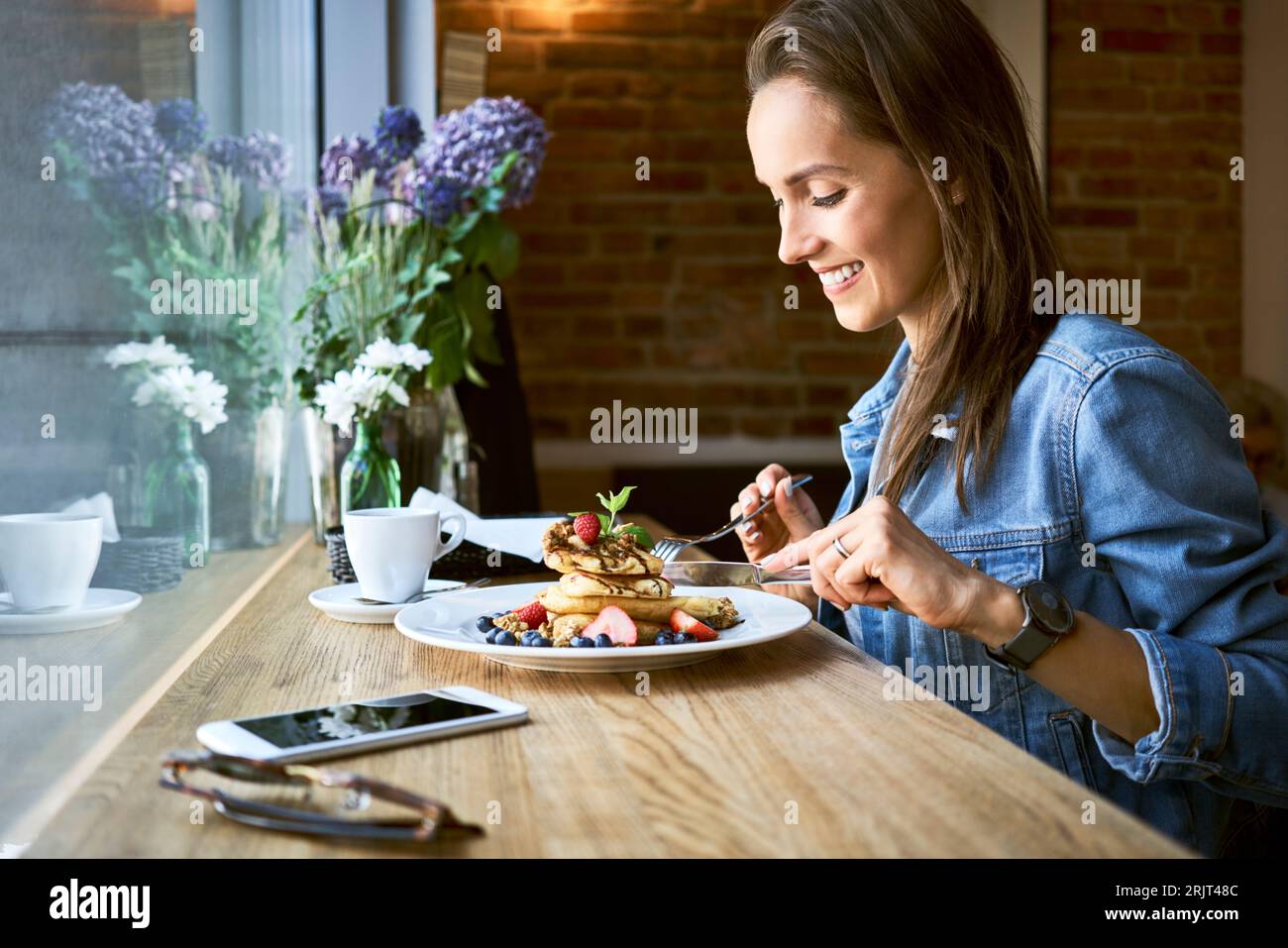 Happy eating dark cafe hi-res stock photography and images - Alamy